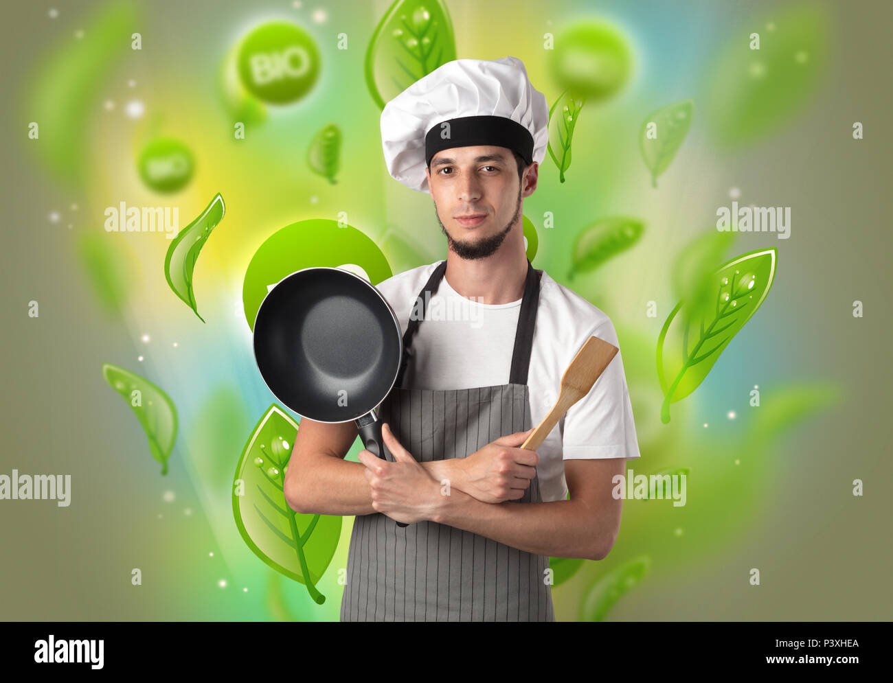 Green bio leaves concept and cook portrait with kitchen tools Stock ...