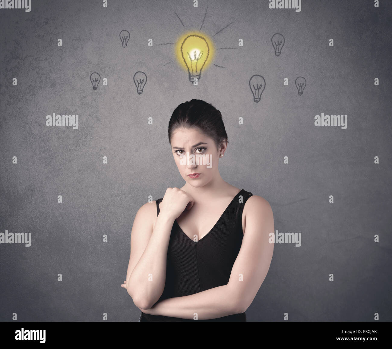 A teen student girl with funny facial expression has a good idea ...