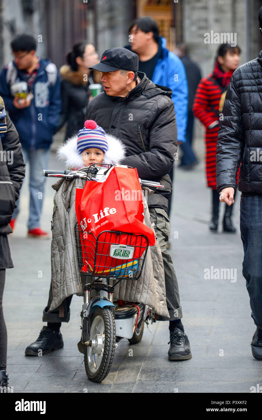 Child cycle street cars hi-res stock photography and images - Alamy
