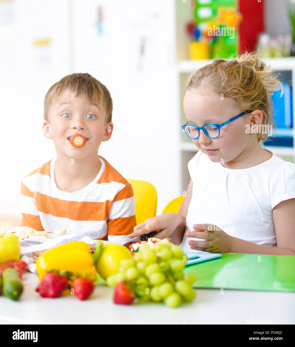 At school - Students prepare their healthy snack themselves Stock Photo ...