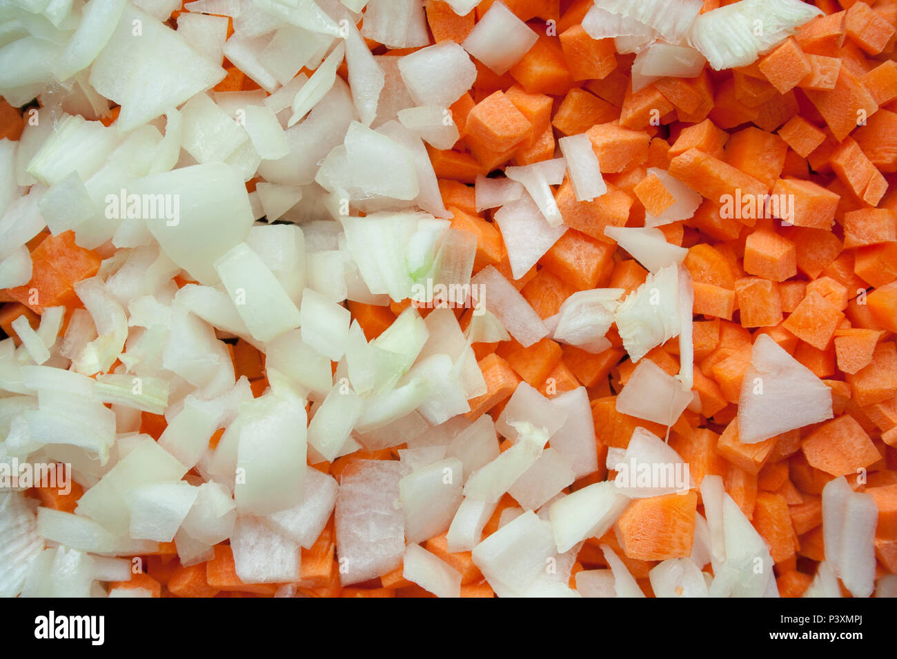 Carrot and onion cutted on top view background Stock Photo - Alamy