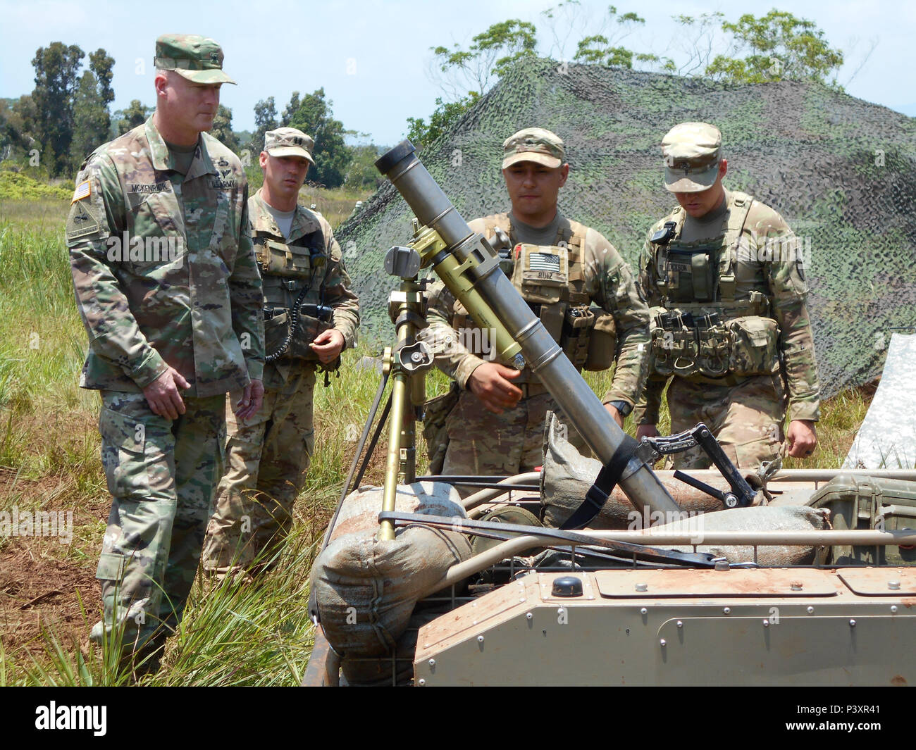 Soldiers of the 25th Infantry Division explain the capabilities of the ...