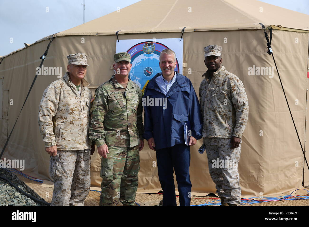 Gen. Robert Neller, Commandant of the Marine Corps, Col. Scott Mitchell ...