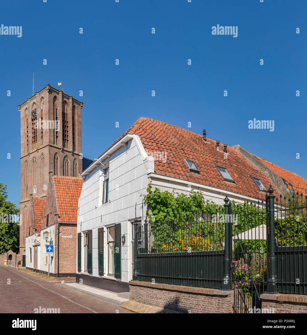 Historical and ancient houses aroud the Big Church Stock Photo - Alamy