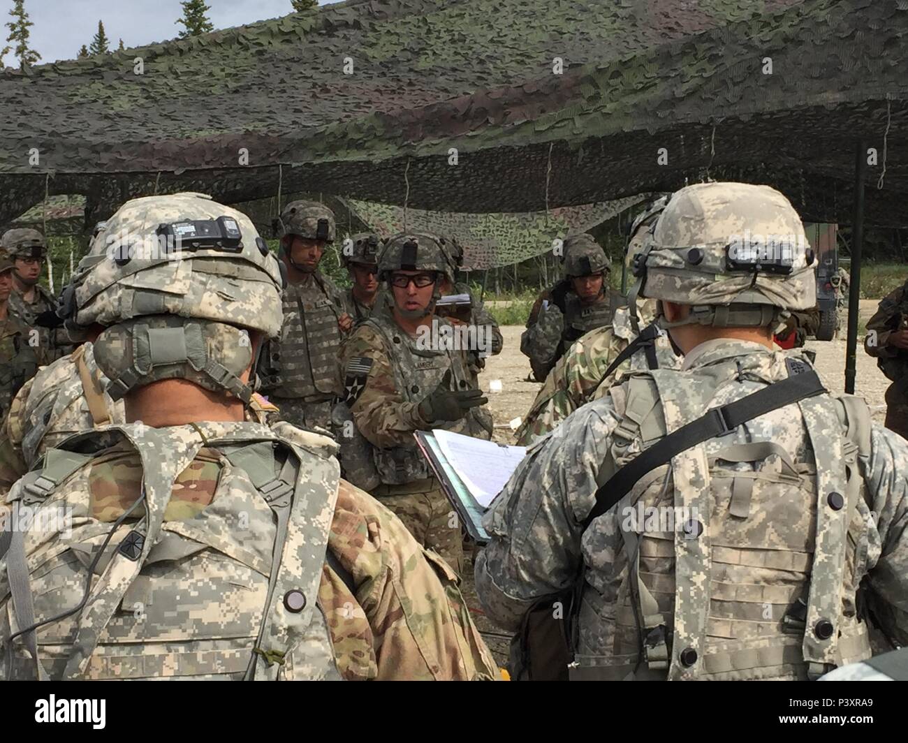 Col. Kevin Lambert, commander of the 1/25 SBCT "Arctic Wolves" gives ...