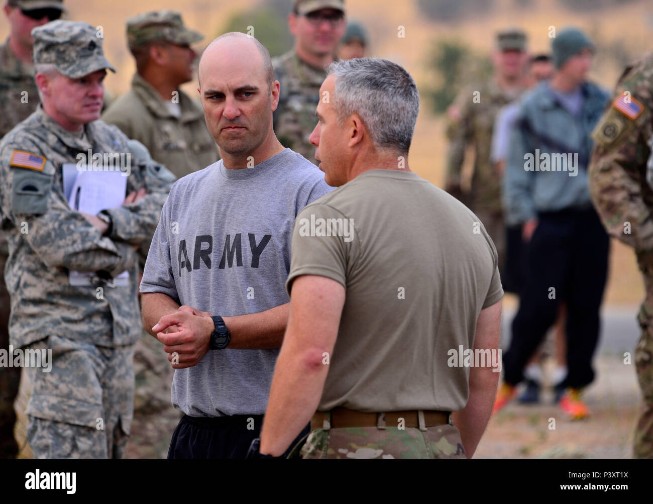Oregon Army National Guard Capt. Alan Widener speaks with Maj. Philip ...