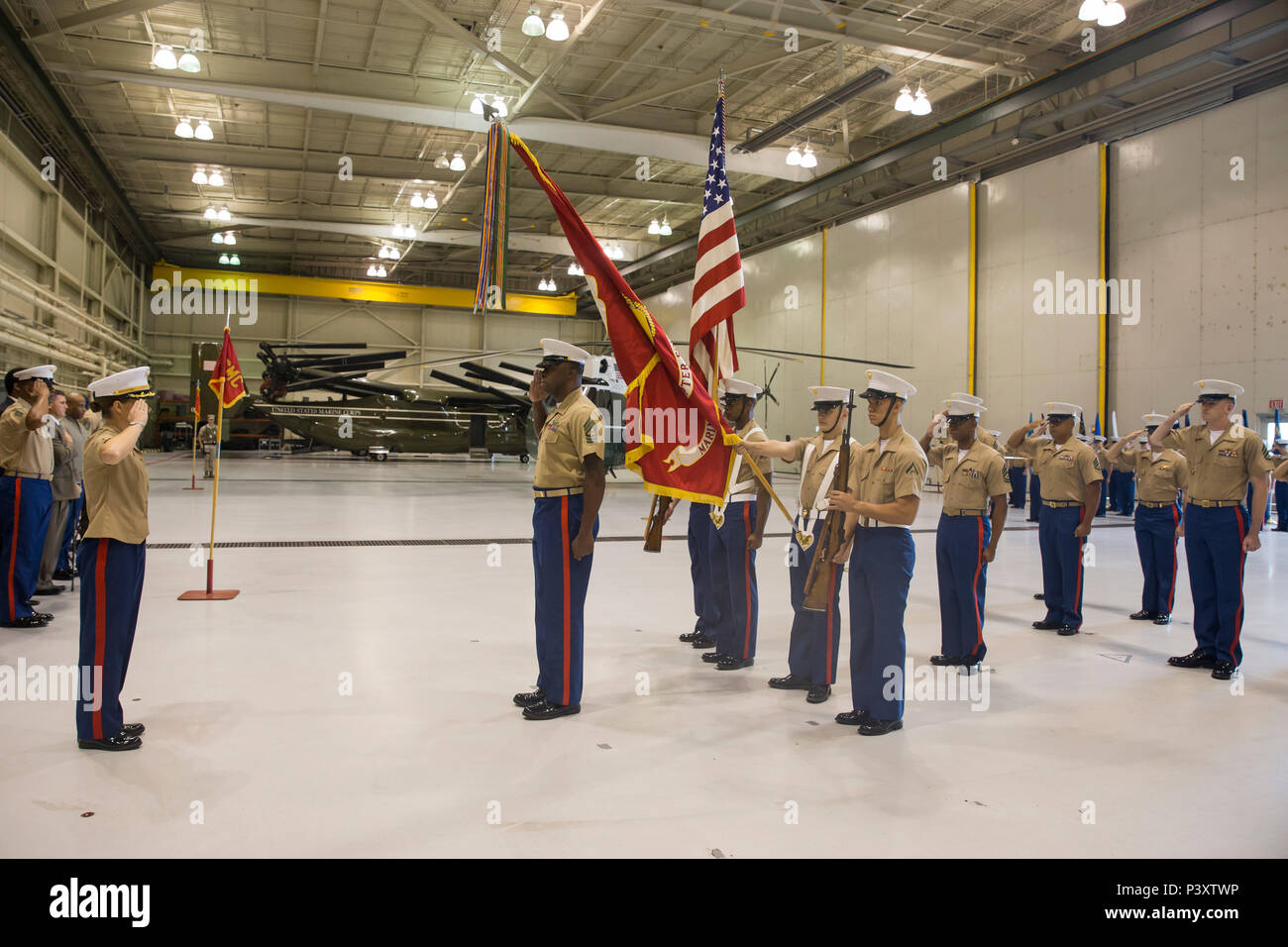 U.S. Marines with Marine Helicopter Squadron 1 perform a present arms ...