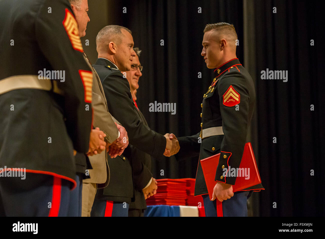 A graduation ceremony is held on behalf of U.S. Marines attached to ...