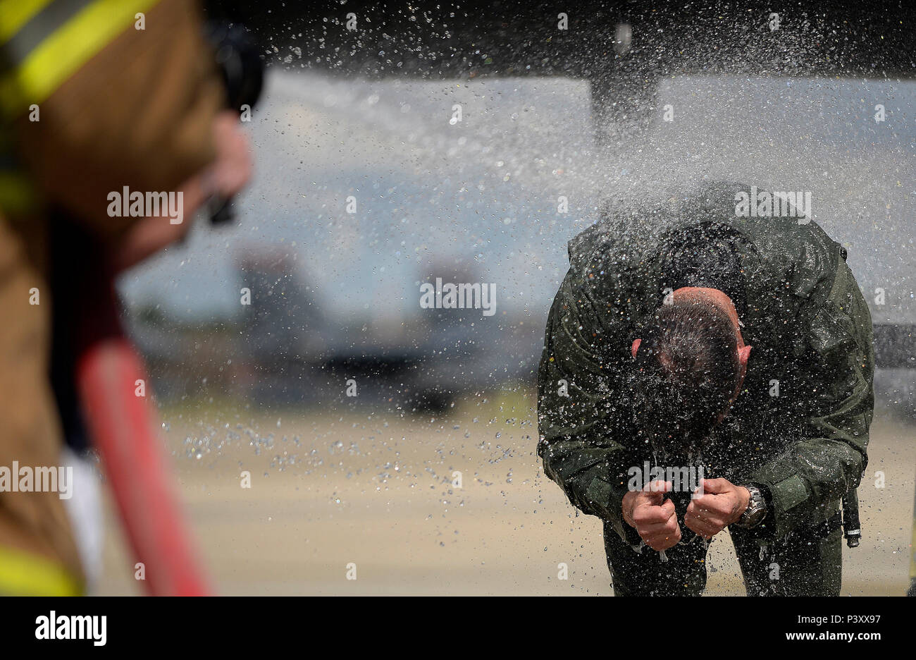 Col. Robert Novotny, 48 Fighter Wing commander, is sprayed with a fire ...