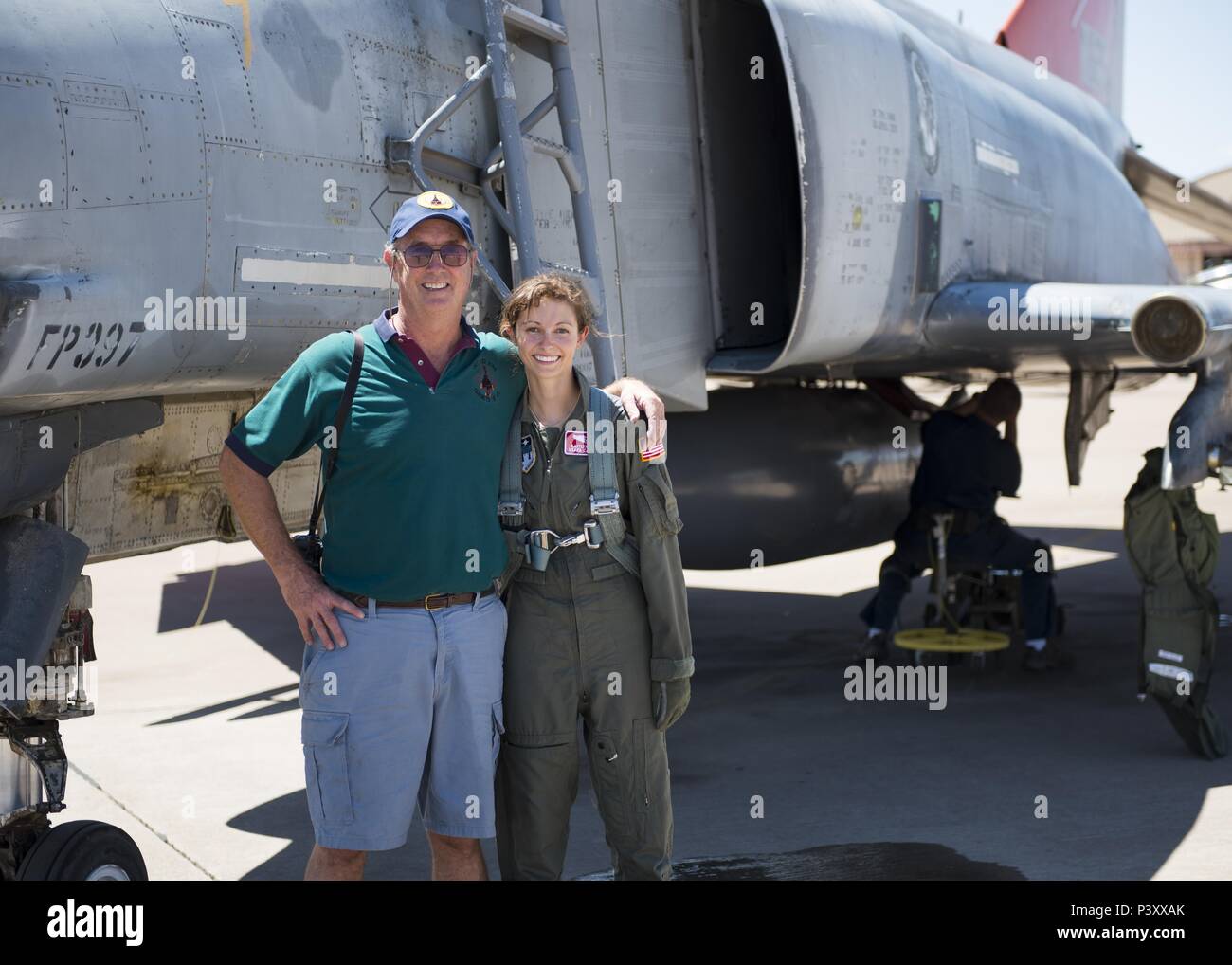 Retired Col. David and his daughter, Cadet 2nd Class Kaitlyn, stand ...