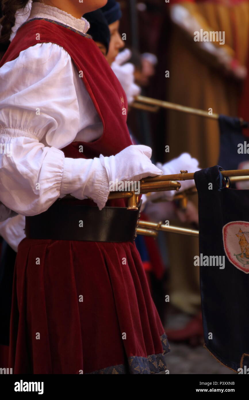 Girl playing the clarina, an ancient instrument, during the ...