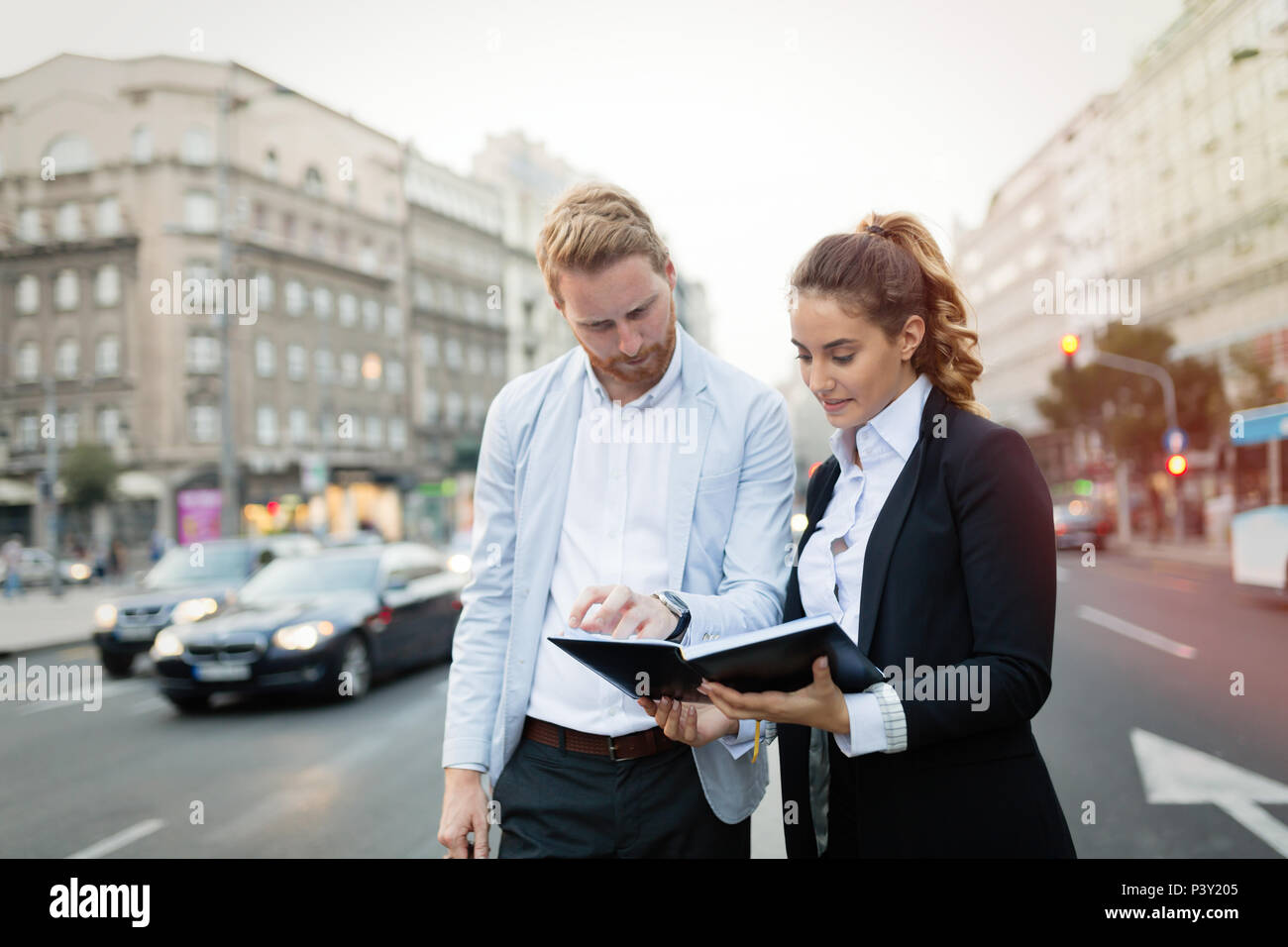 Businesspeople commuting and walking in city Stock Photo - Alamy