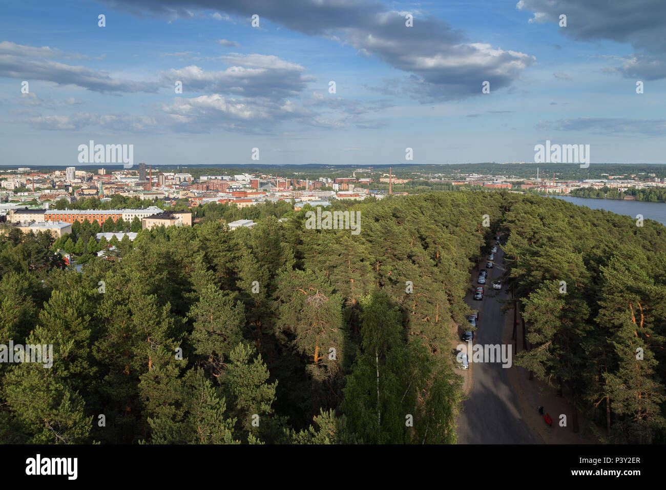 City of Tampere, Finland, and lush trees at the Pyynikki ridge viewed ...