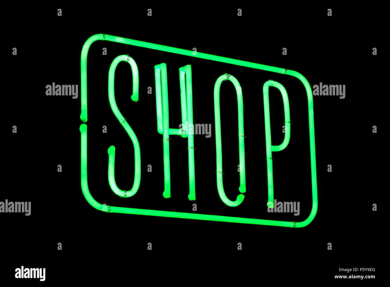 Shop neon sing isolated over a black background Stock Photo - Alamy