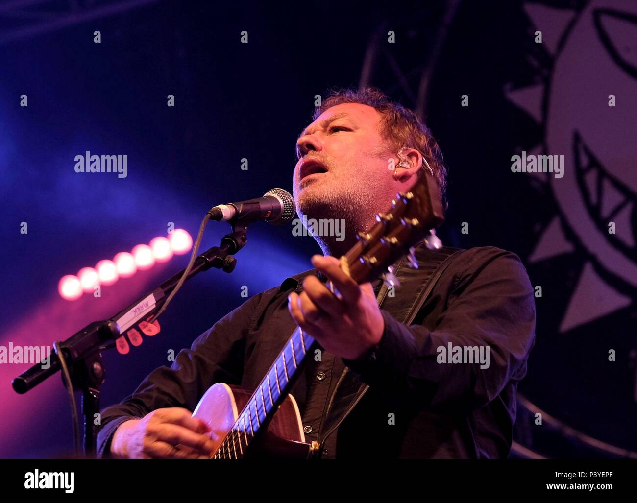 Lead vocalist Mark Chadwick with British folk band the Levellers ...