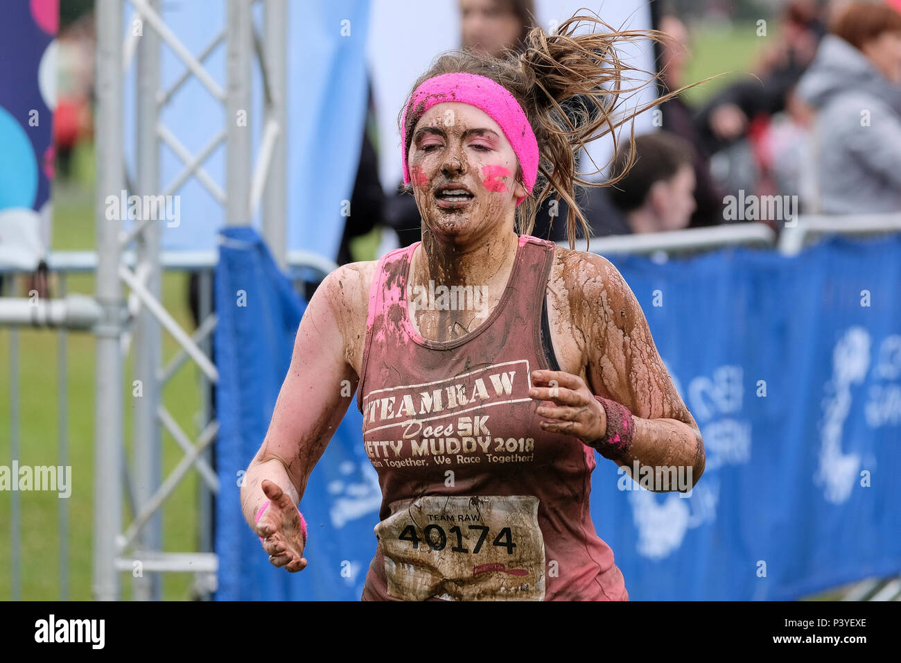 Ladies taking part in a 'Muddy 5k' fun run in aid of Cancer Research UK ...