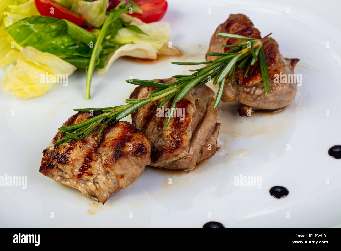 Delicious beef medallions with salad Stock Photo - Alamy