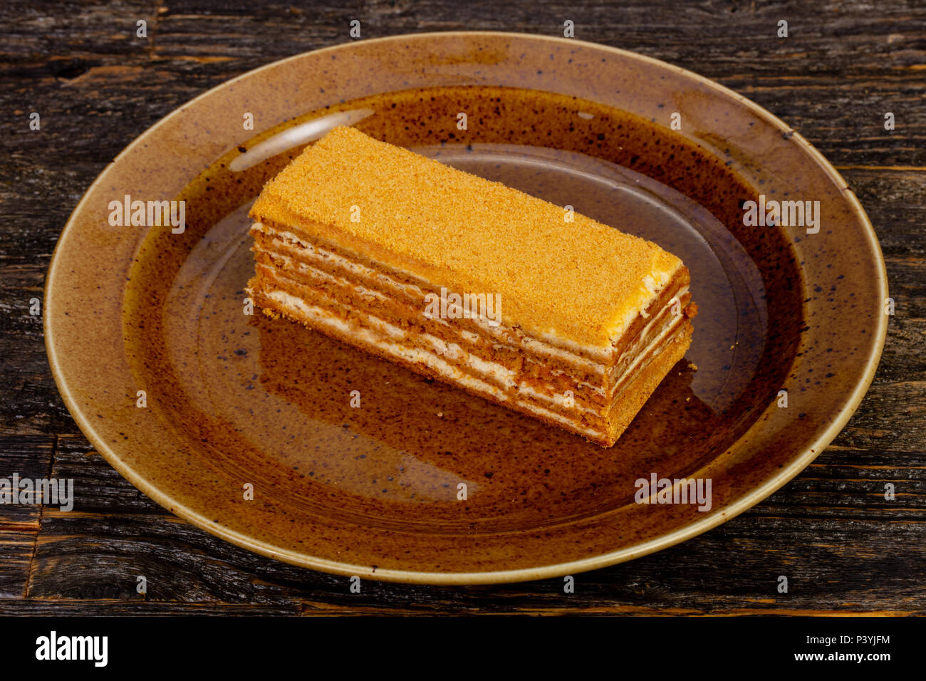 Delicous honey multi layered cake Stock Photo - Alamy
