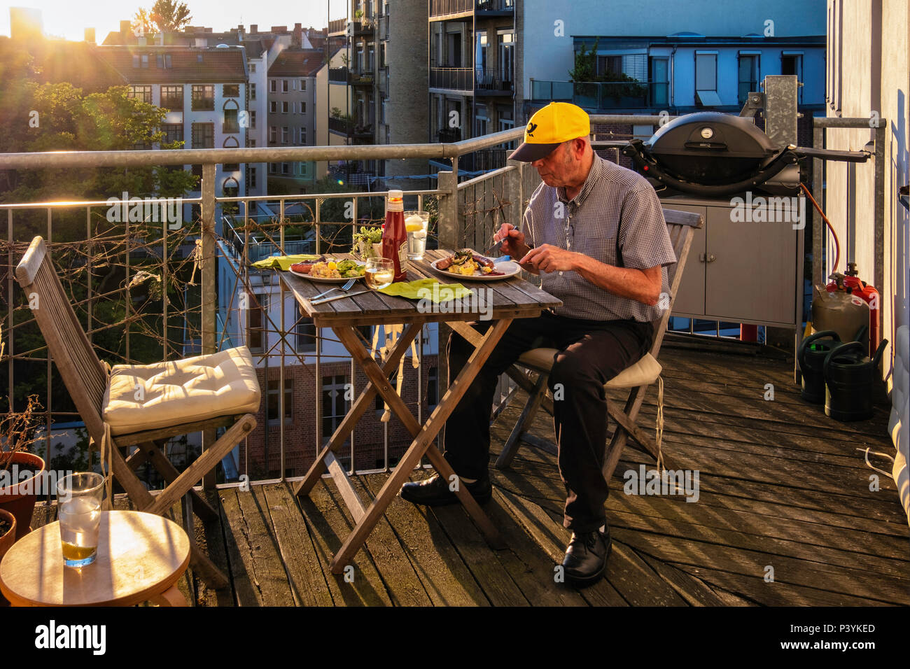Elderly man eating dinner hi-res stock photography and images - Alamy