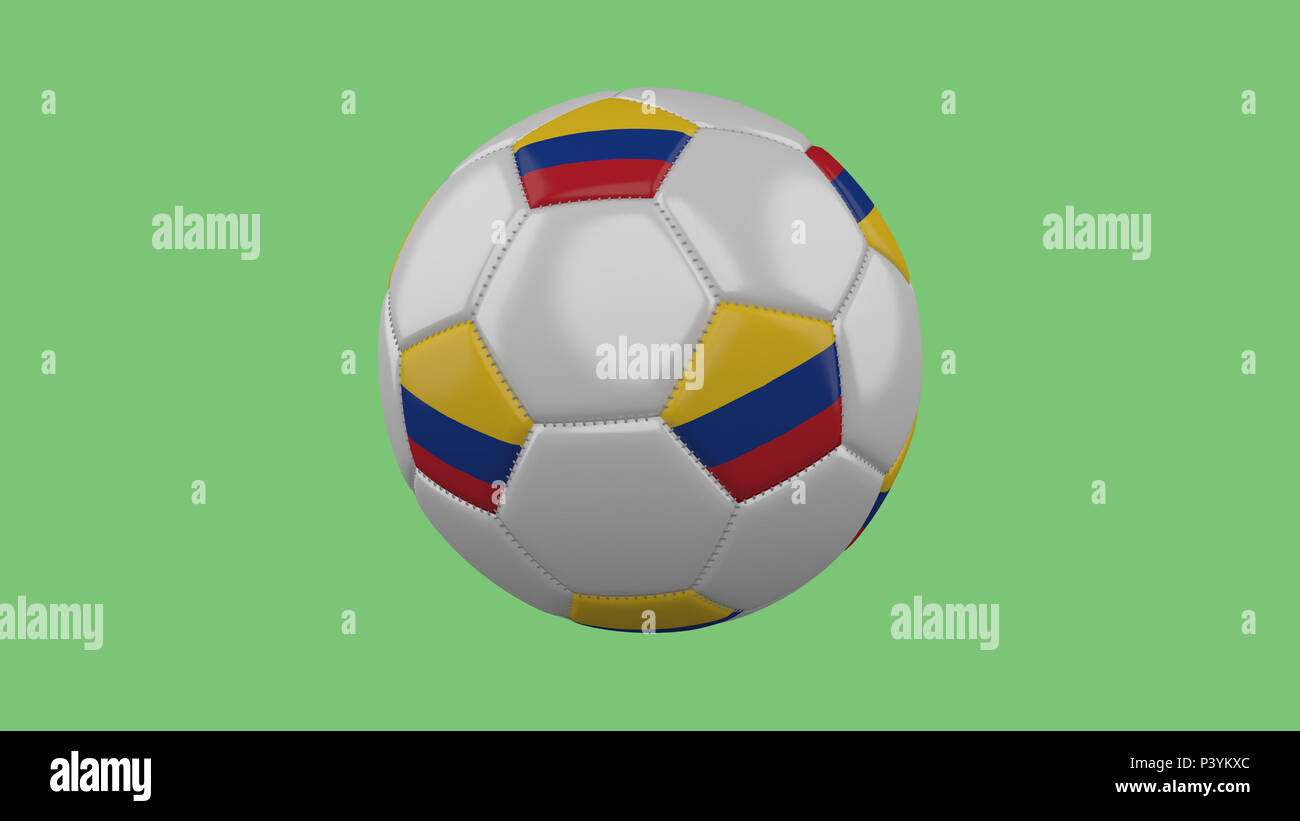 Soccer ball with Colombia flag isolate on a green background, 3D ...