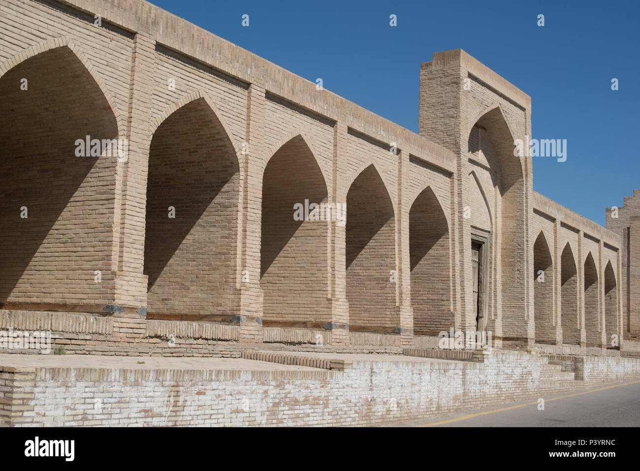 The old building, the wall with arches. Ancient buildings of medieval ...