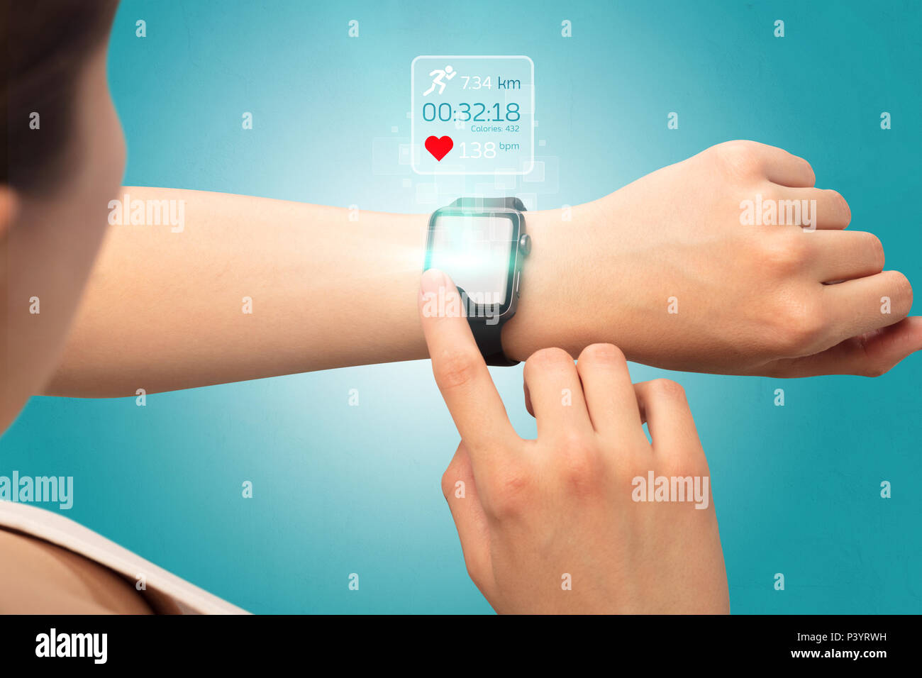 Female hand with smartwatch and running concept above Stock Photo - Alamy
