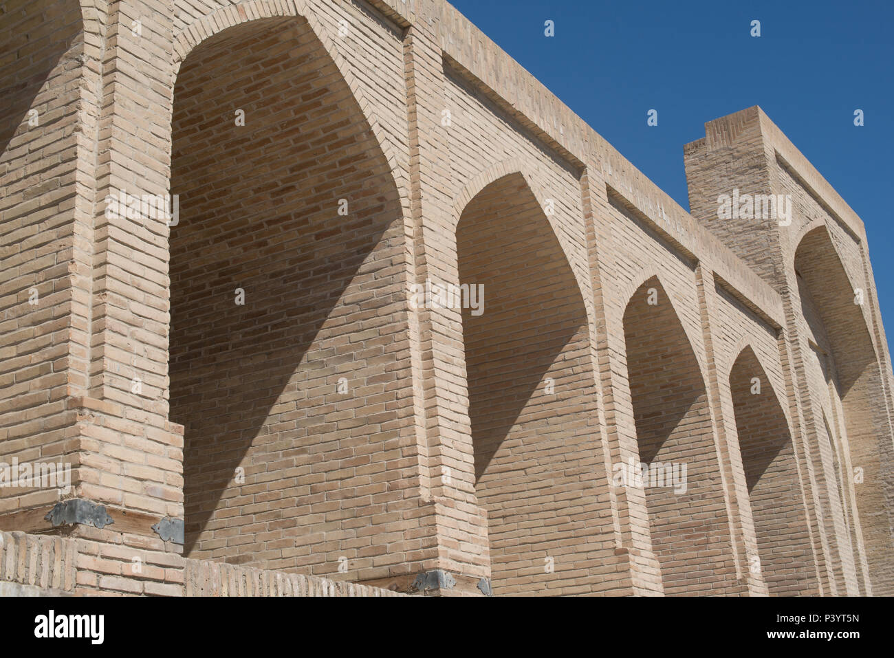 The old building, the wall with arches. Ancient buildings of medieval ...