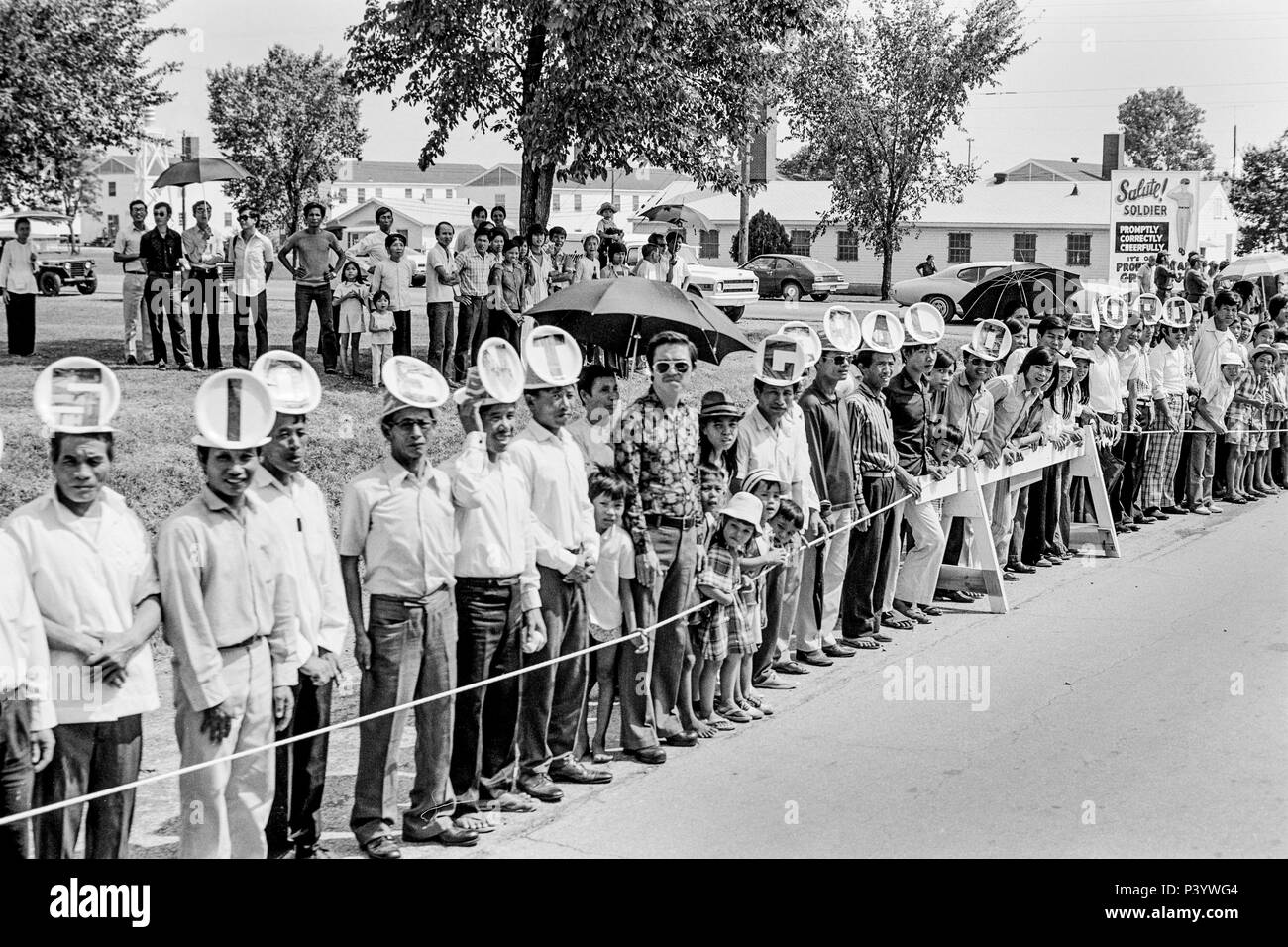 FORT SMITH, AR, USA - AUGUST 10, 1975 -- Long lines of Vietnamese ...