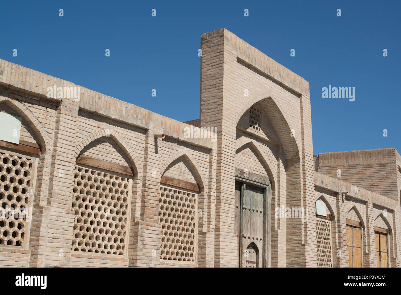 An old brick building, with elements of arches. Ancient buildings of ...