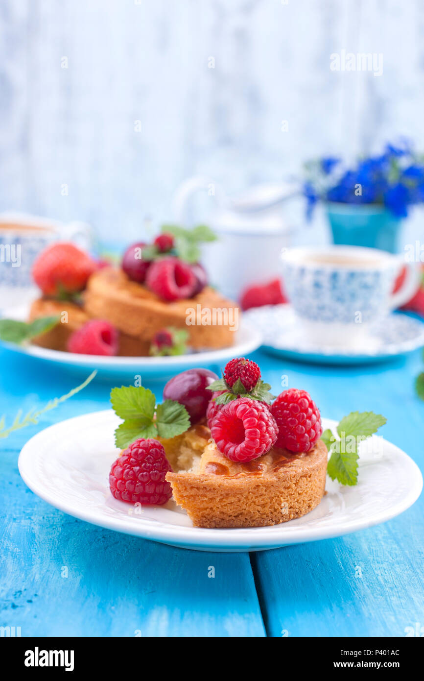 Delicious summer breakfast, homemade pastries and fragrant coffee. On a ...