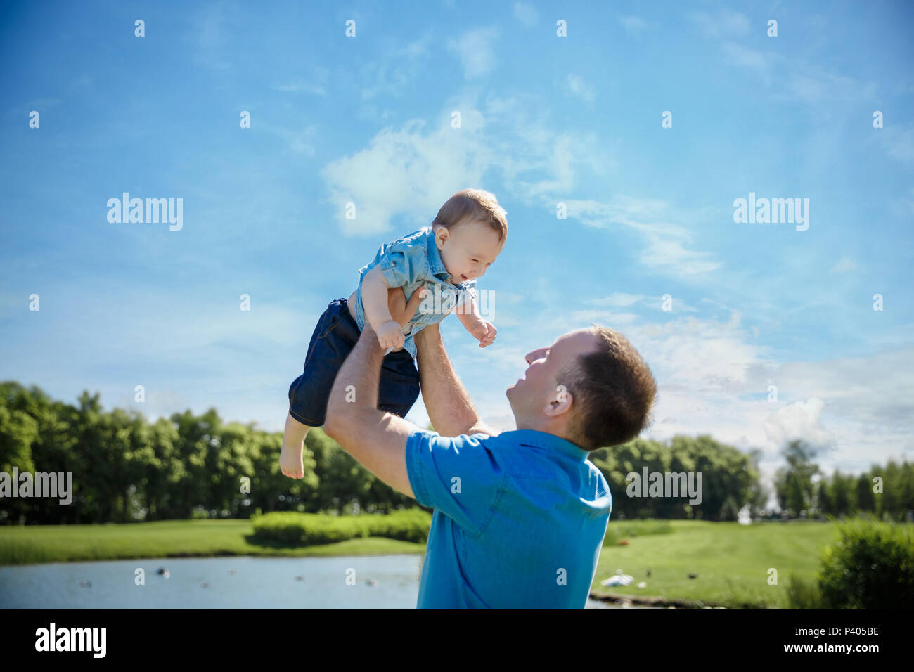 Father dad throwing boy child hi-res stock photography and images - Alamy