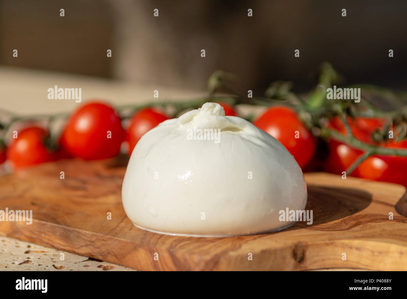Fresh soft white burrata, buttery cheese, made from a mix of mozzarella ...