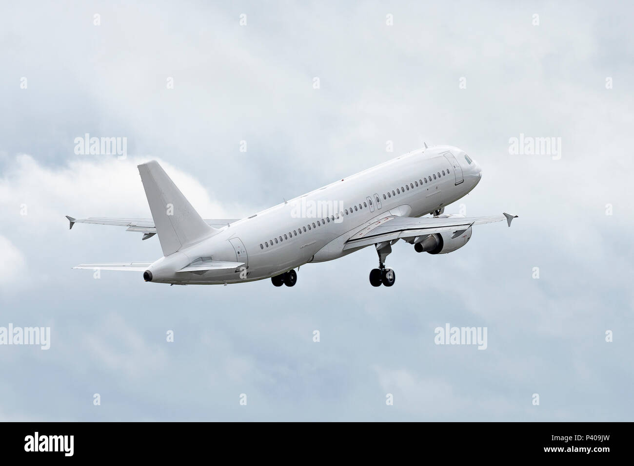 An Airbus A320 commercial airliner with blank livery taking off Stock ...