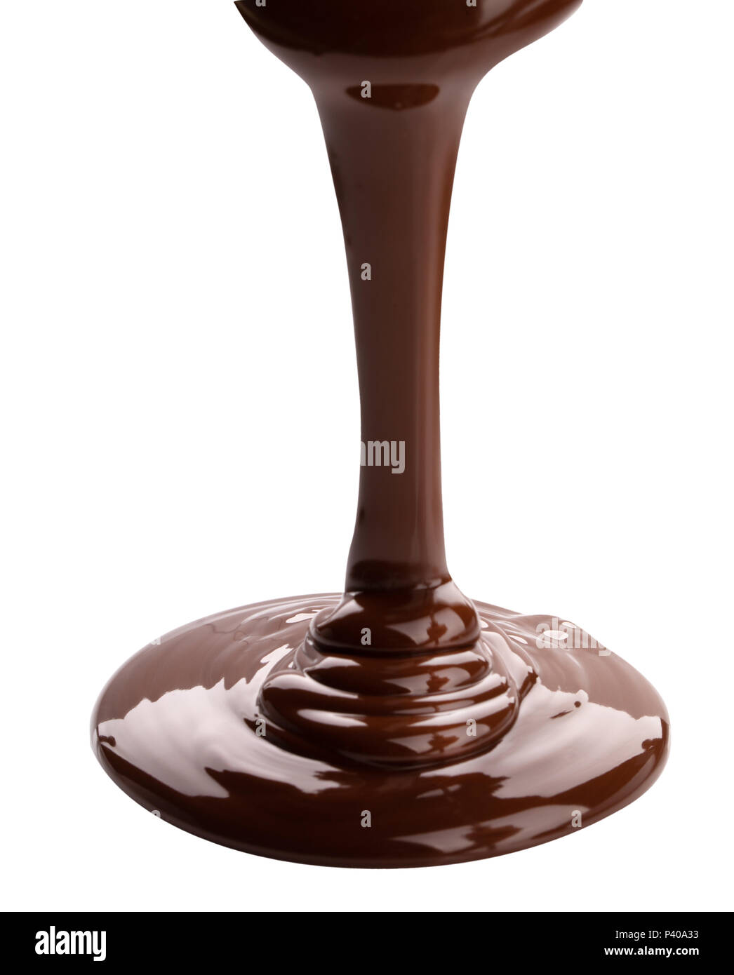 Melted chocolate flowing. Isolated on white background Stock Photo - Alamy