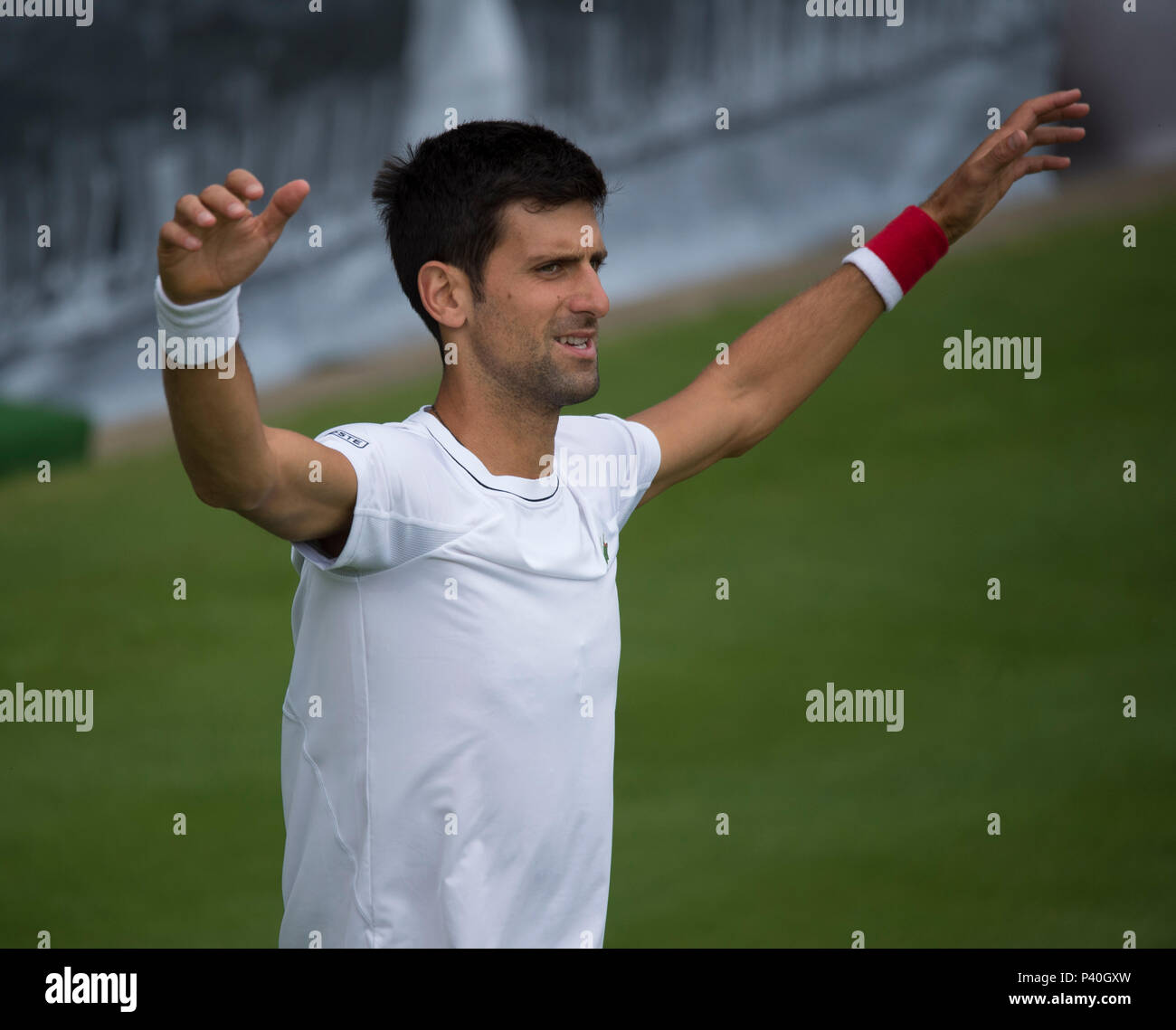 Novak djokovic stretching hi-res stock photography and images - Alamy