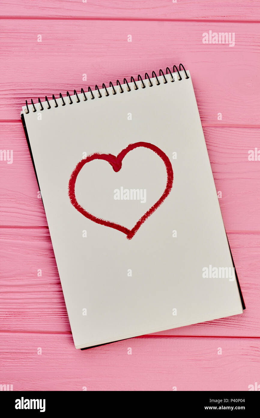 Heart drawn on paper notepad. Image of heart drawn with lipstick on ...