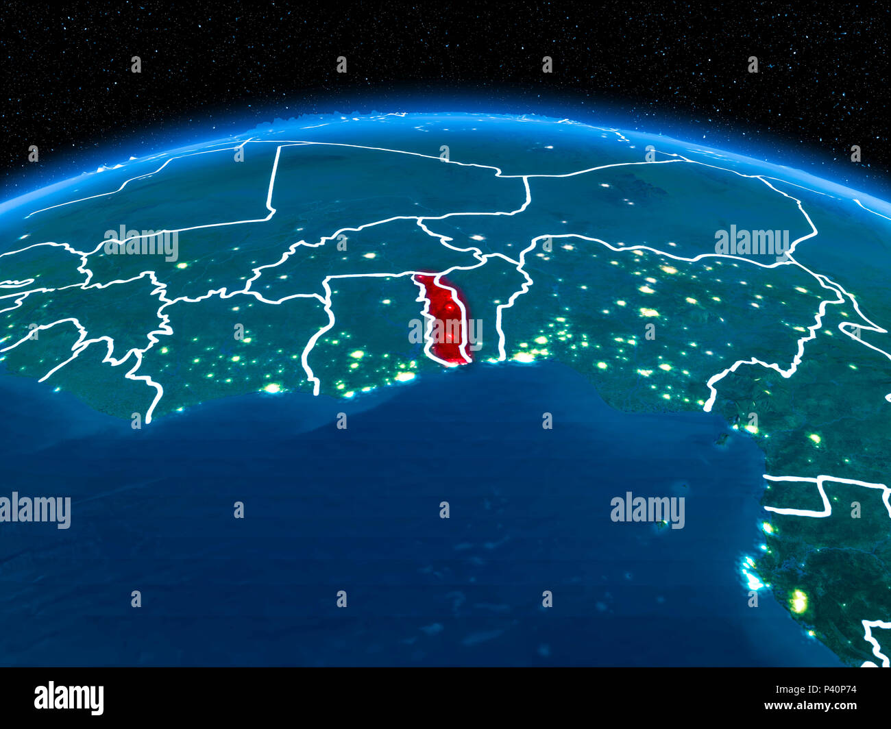 Orbit view of Togo highlighted in red with visible borderlines and city lights on planet Earth ...