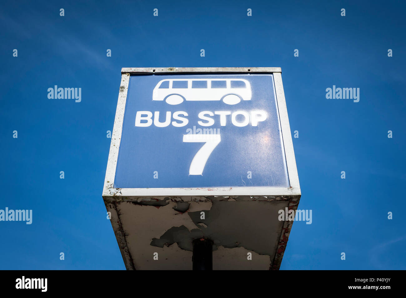 blue bus stop sign against a blue sky at Gatwick Airport, Shuttle Bus ...