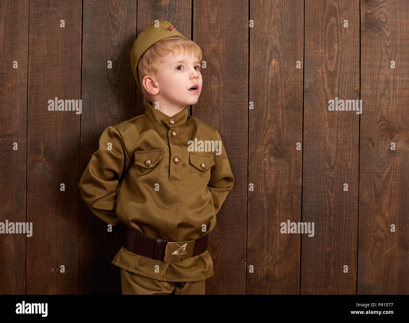 children are dressed as soldier in retro military uniforms Stock Photo ...
