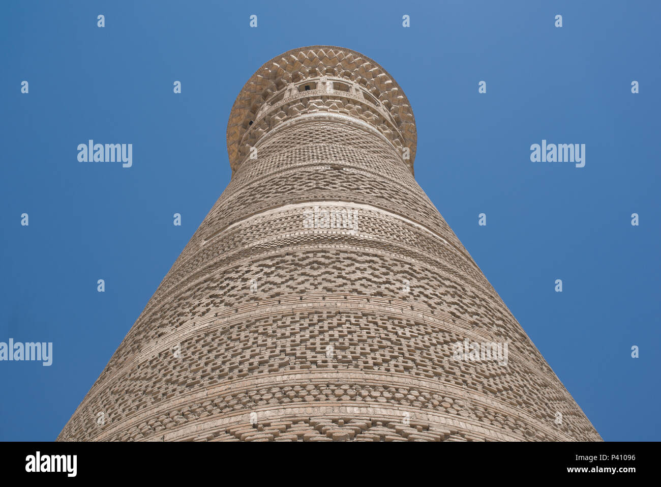 High oval tower of bricks, ancient Asian buildings. the details of the ...