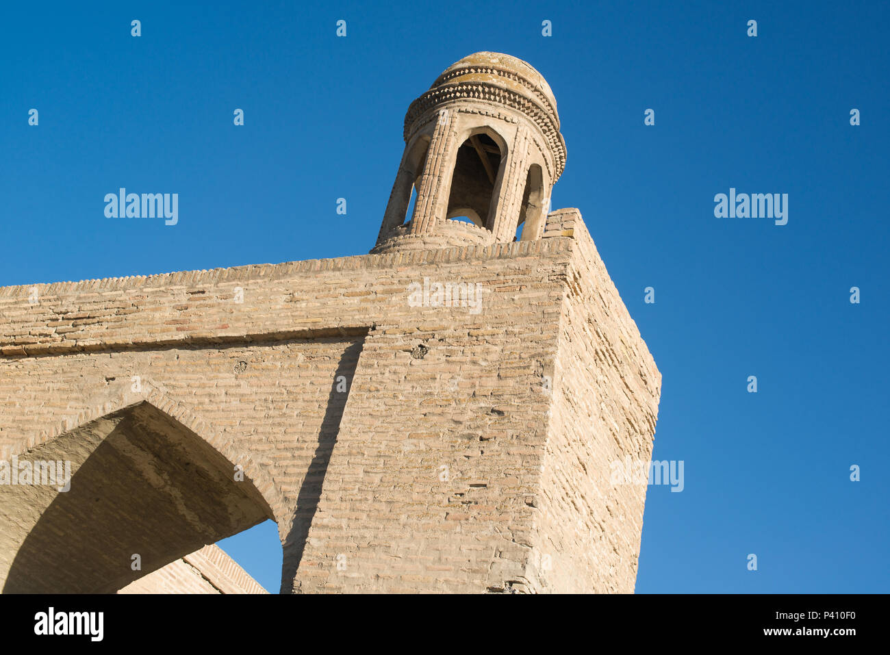 Old building with arch and dome. The ancient buildings of medieval Asia ...