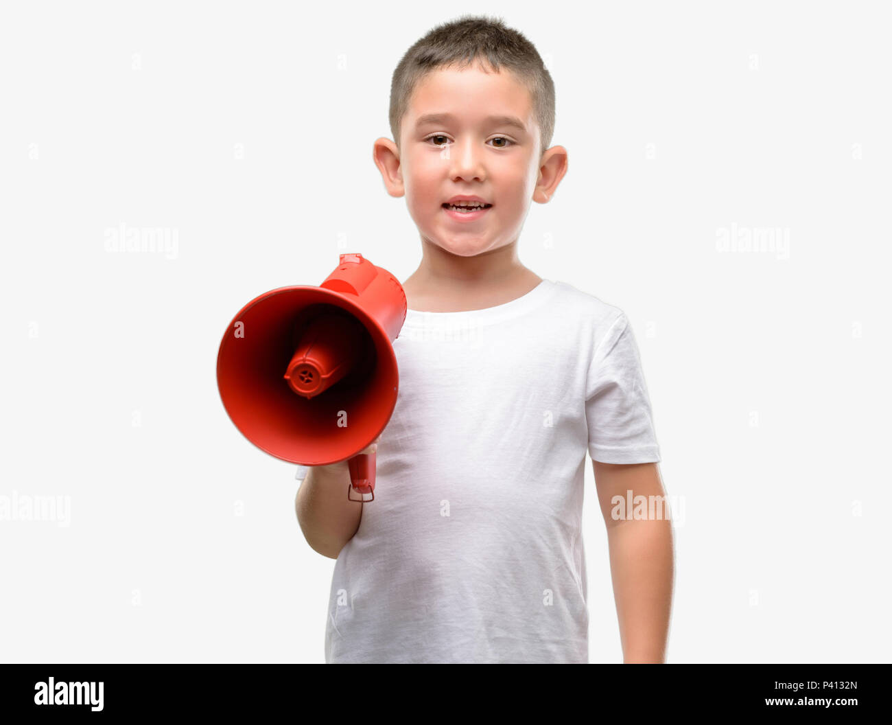 Dark haired little child holding megaphone with a happy face standing ...