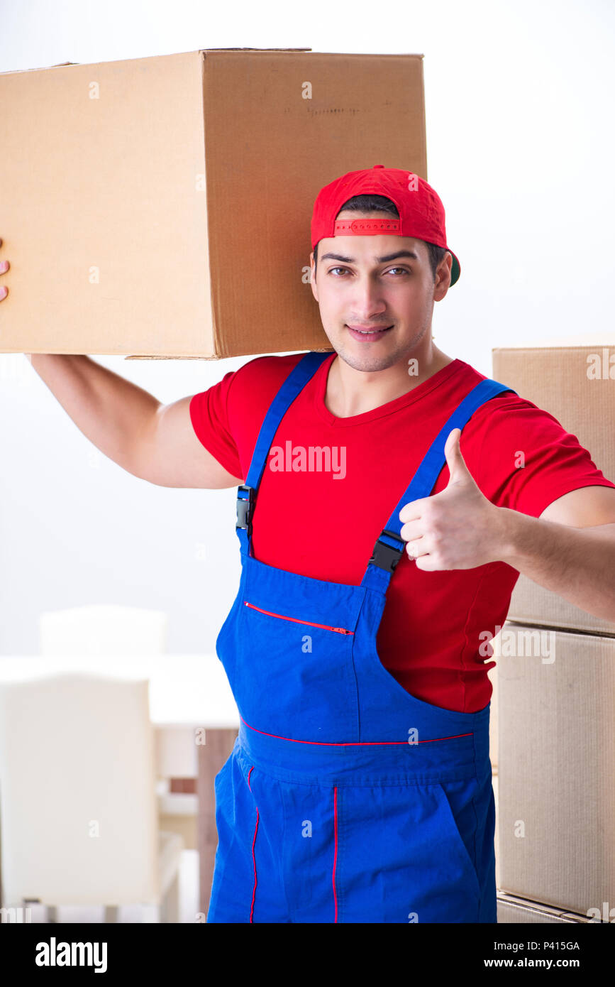 Contractor worker moving boxes during office move Stock Photo - Alamy