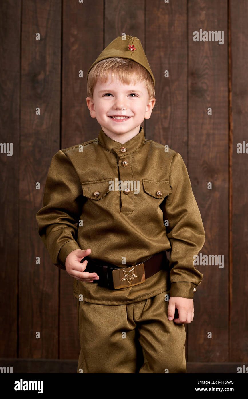 children are dressed as soldier in retro military uniforms Stock Photo ...