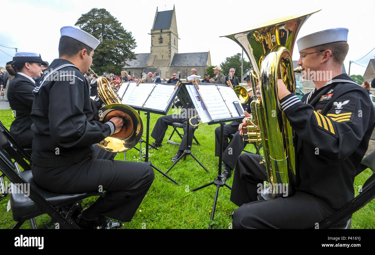 Members of the U.S. Naval Forces Europe Band Brass Quintet play music ...