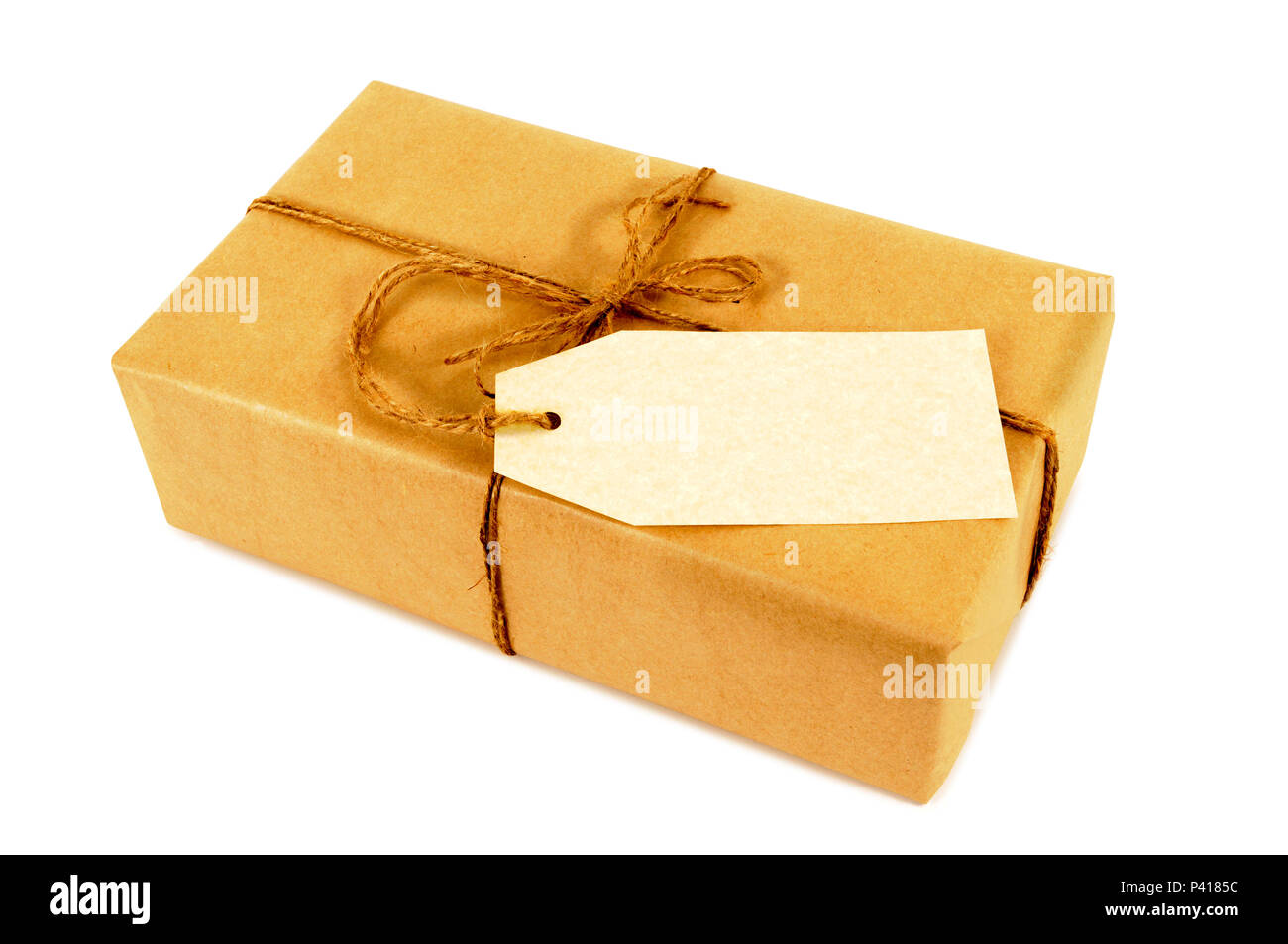 Brown paper package tied with string Stock Photo - Alamy