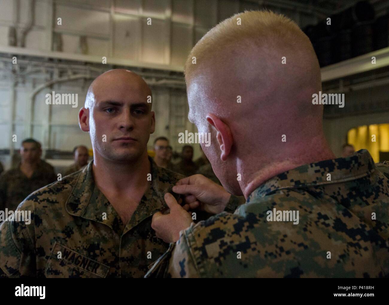 U.S. Marine Cpl. Matthew A. Wagner, with Task Force Koa Moana 16, is ...
