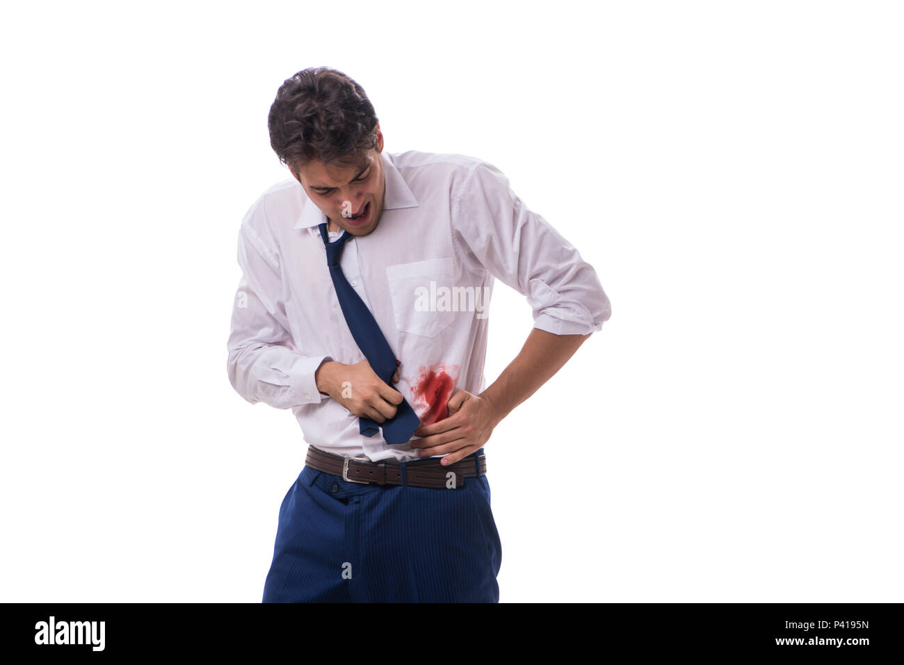 Wounded businessman with blood stains isolated on white background ...