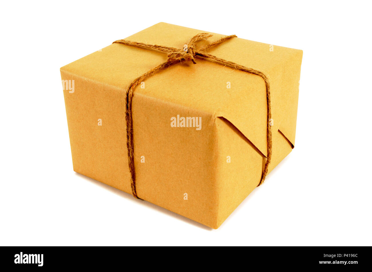 Square brown paper package tied with string Stock Photo - Alamy