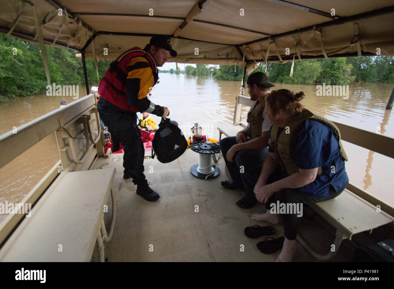 Texas Task Force 1 Urban Search and Rescue members bring evacuating ...